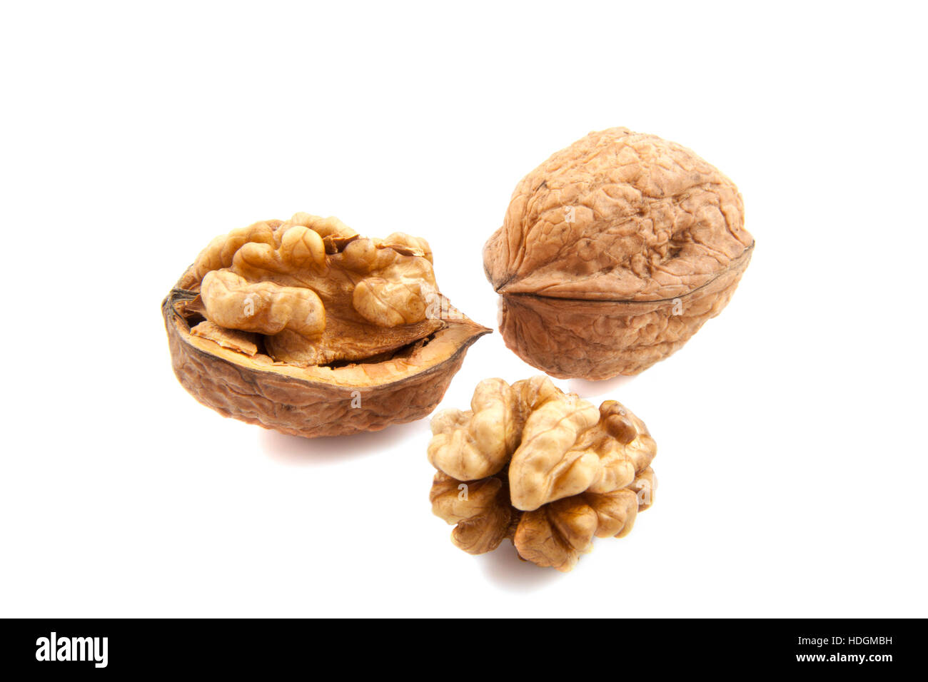 Three fresh walnuts on a white background Stock Photo - Alamy