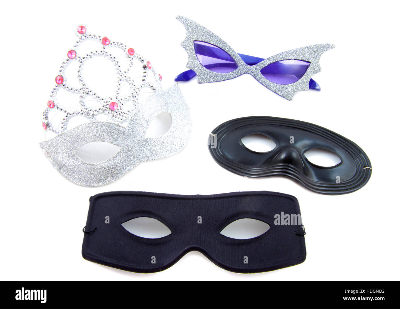 Different kind of fun carnival masks over white Stock Photo - Alamy