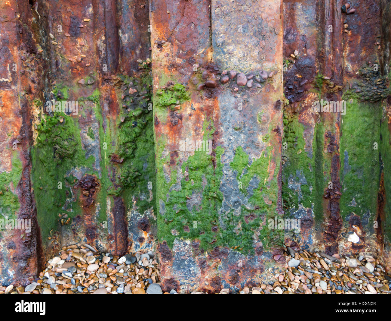 Heavily rusted and corroded steel interlocking sea defenses with ...