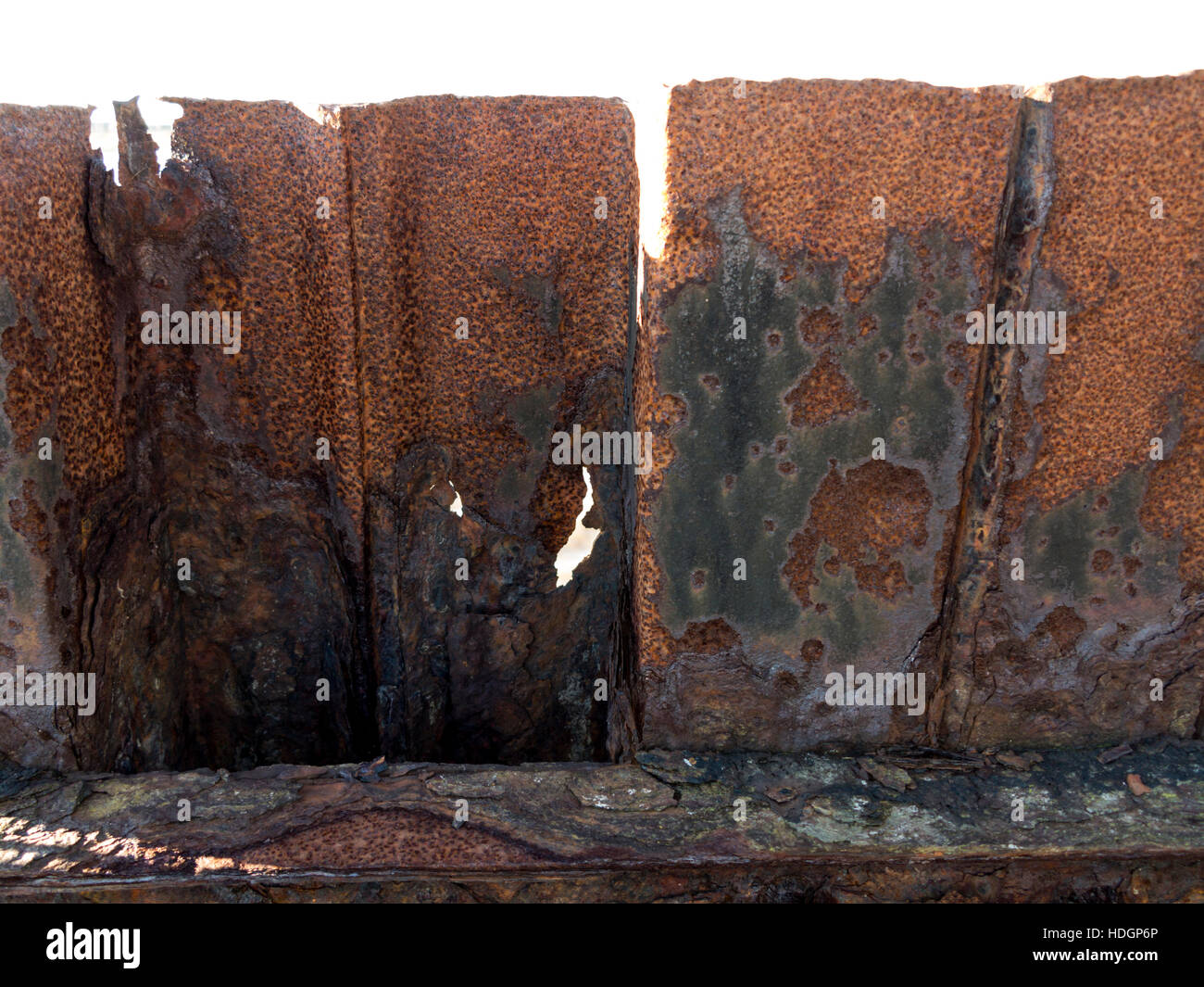 Heavily rusted and corroded steel interlocking sea defenses Stock Photo ...