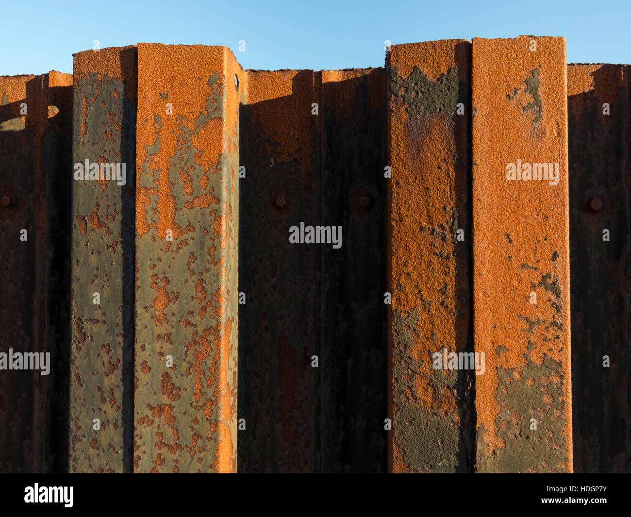 Heavily rusted and corroded steel interlocking sea defenses against ...