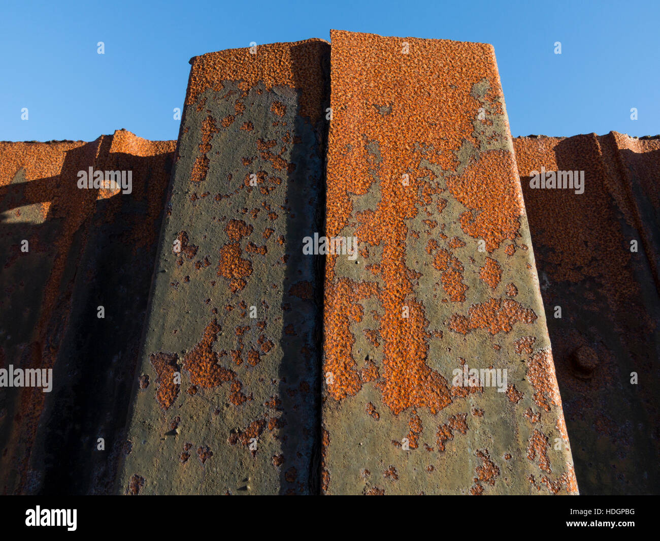 Heavily rusted and corroded steel interlocking sea defenses against ...