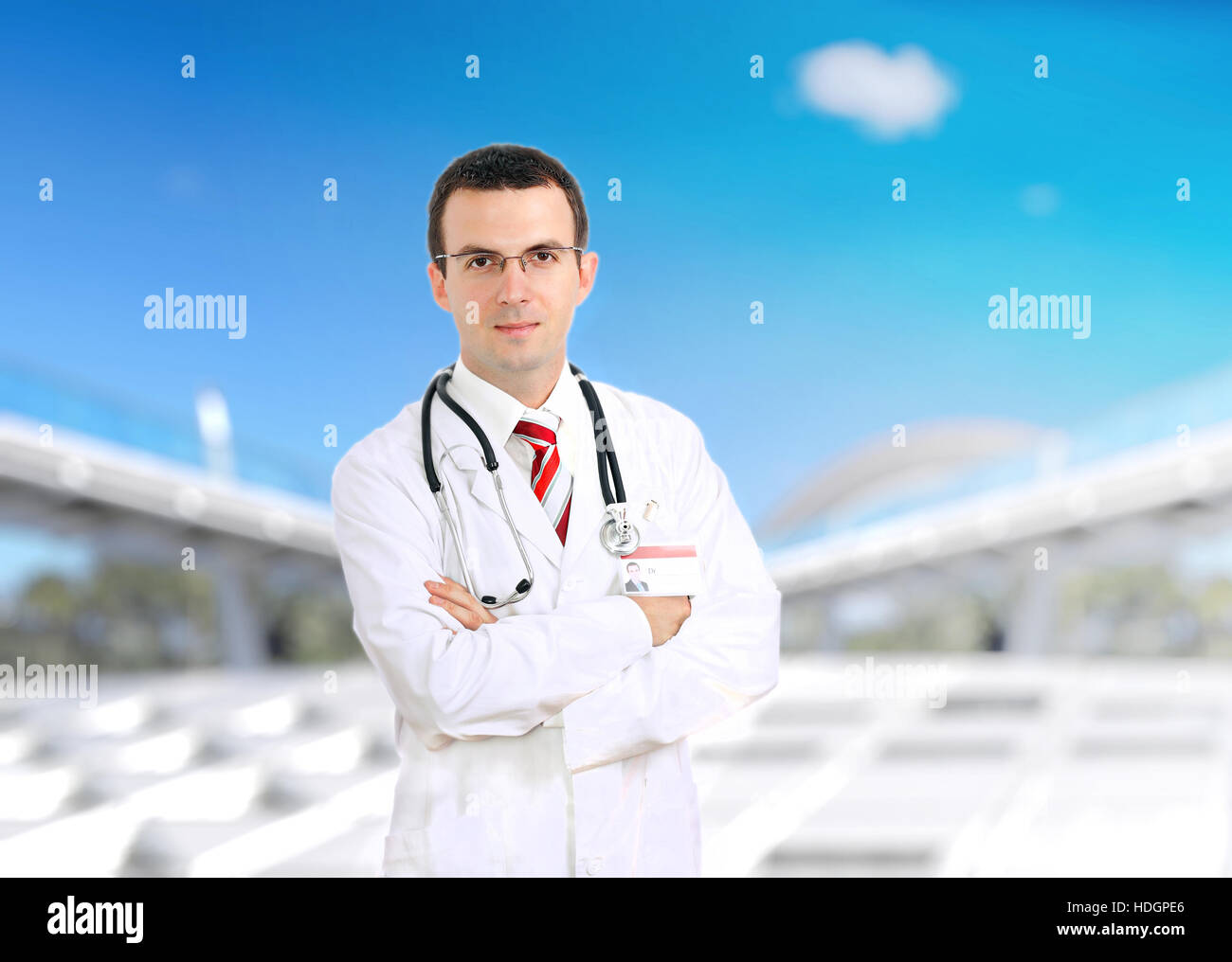 Doctor stand near the Hospital main Entrance. Outdoor Stock Photo - Alamy