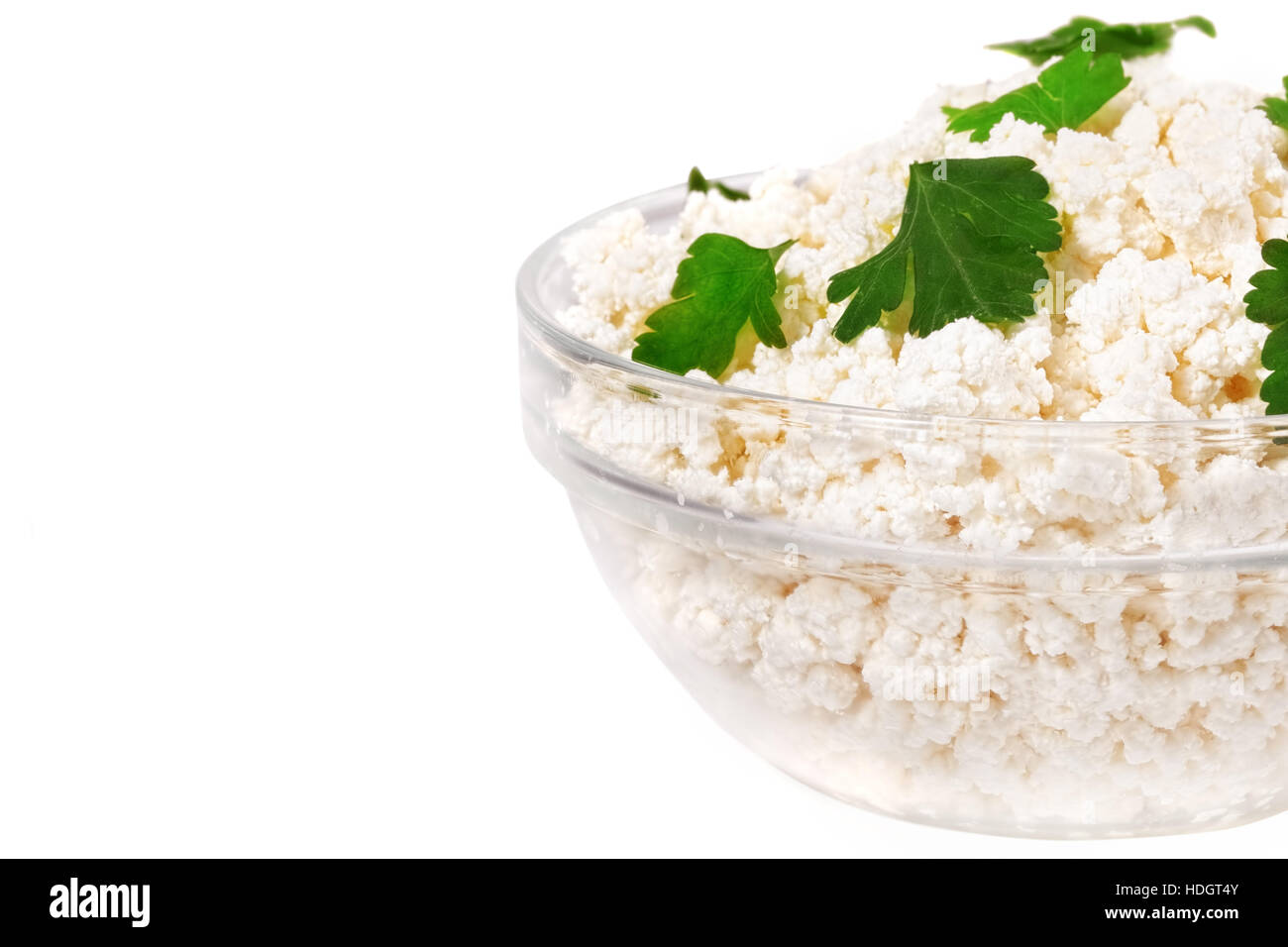 Fresh cottage cheese (curd) in glass bow, isolated on white background ...