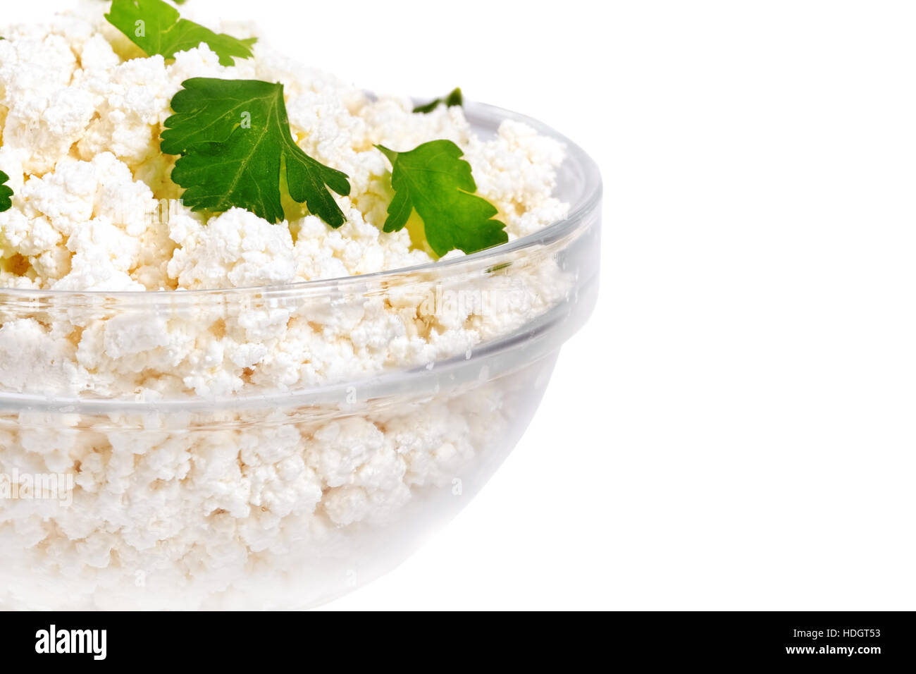 Fresh cottage cheese (curd) in glass bow, isolated on white background ...