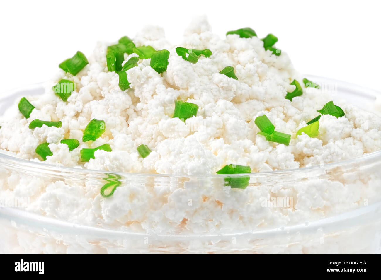 Fresh cottage cheese (curd) in glass bow, isolated on white background ...