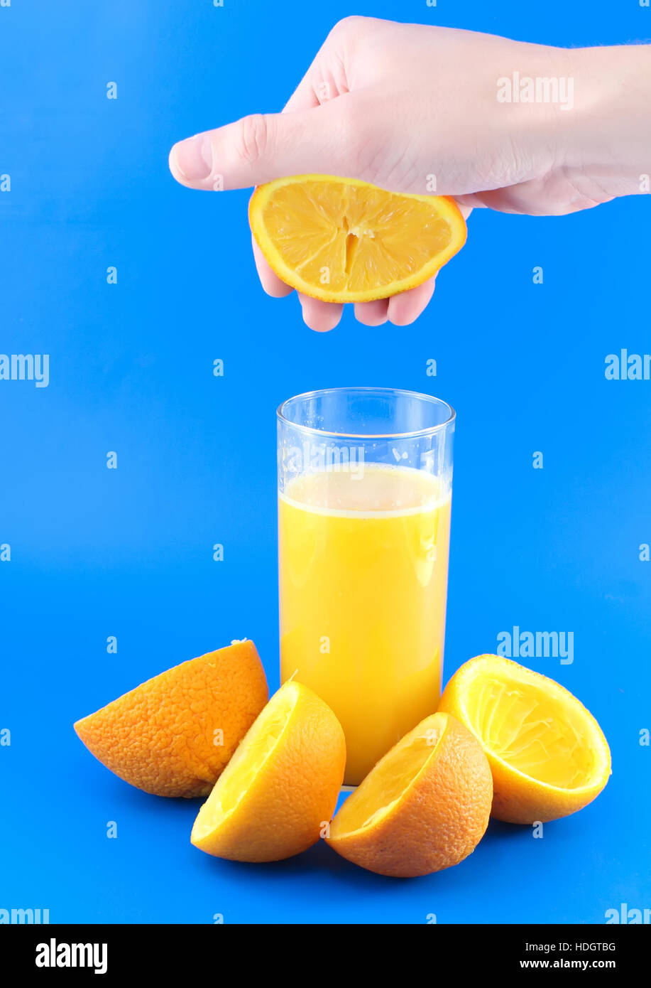 Hand squeeze orange hi-res stock photography and images - Alamy