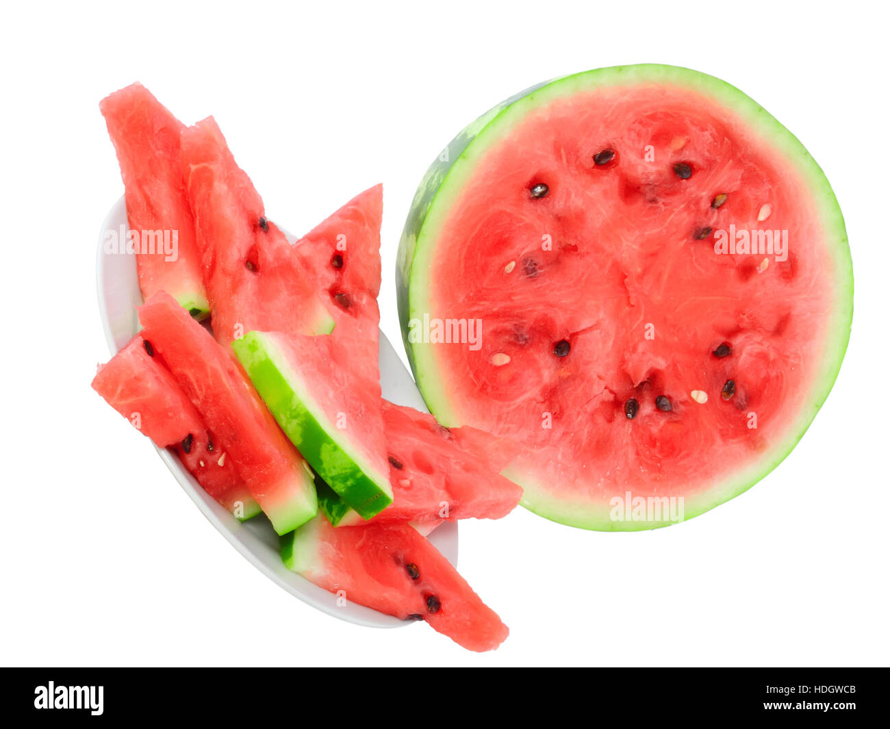 Half watermelon with juicy slice Cut Out Stock Images & Pictures - Alamy
