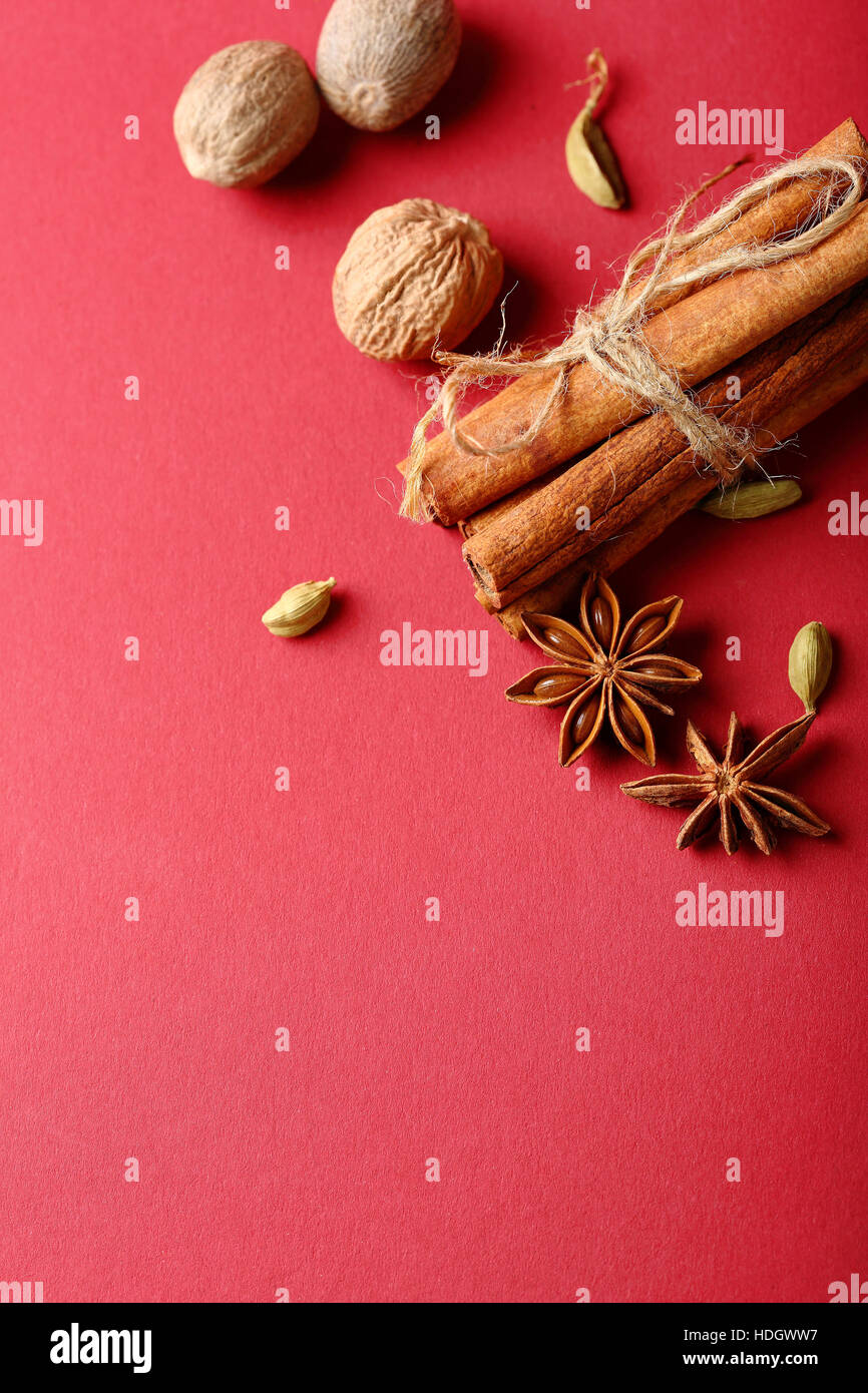 Red background with spice, food Stock Photo - Alamy