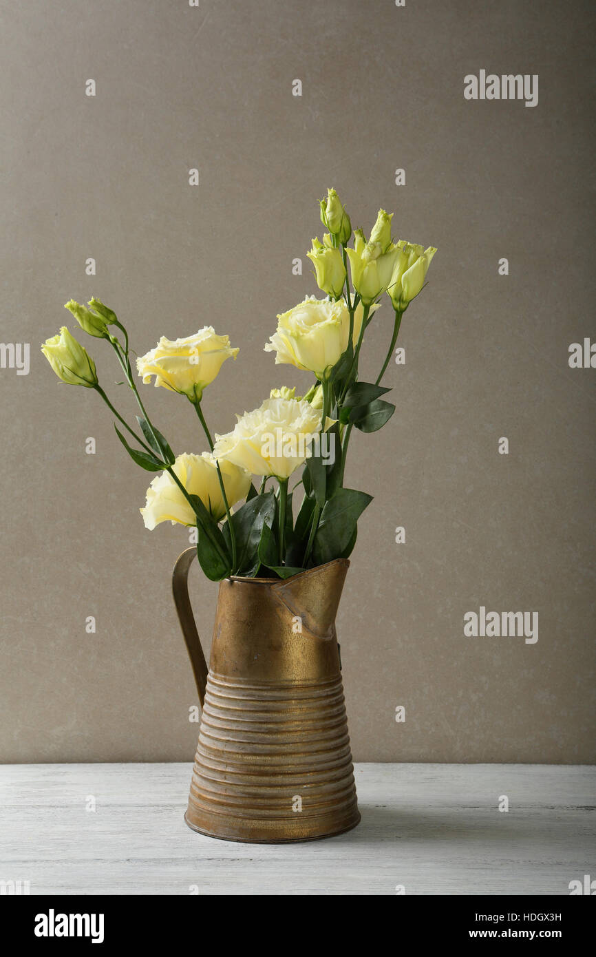 Flowers bouquet in ancient pitcher Stock Photo - Alamy
