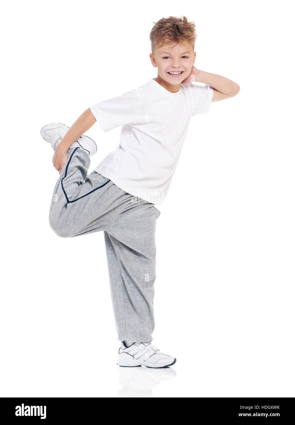 Little boy dancing on white Stock Photo - Alamy