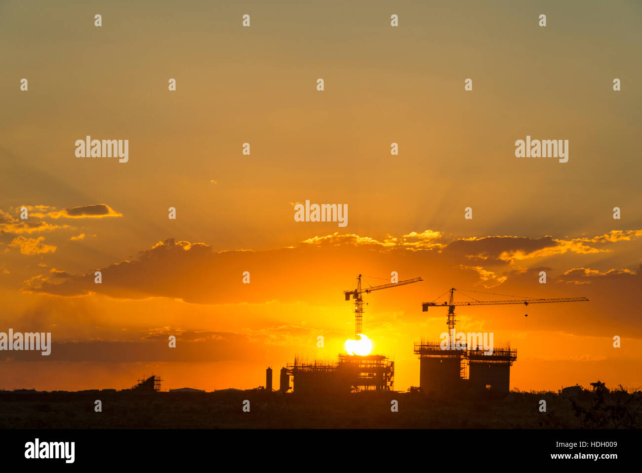 construction Zimbabwe Africa crane sunset develop Stock Photo - Alamy