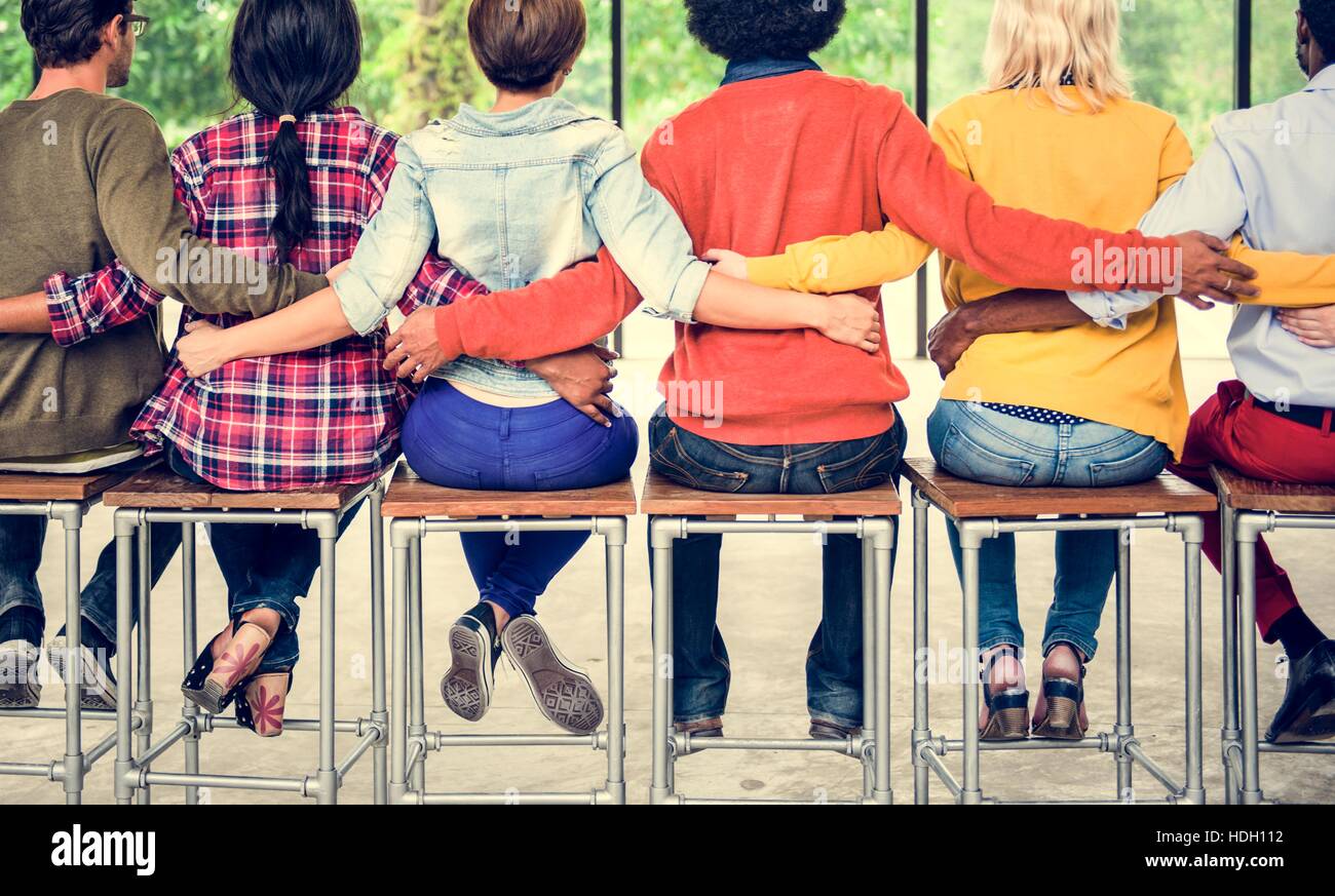 People Friendship Team Rear View Huddle Sitting Concept Stock Photo - Alamy