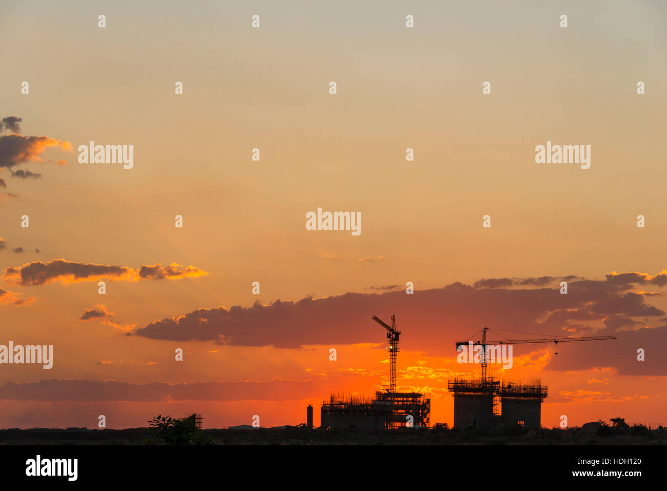 construction Zimbabwe Africa crane sunset develop Stock Photo - Alamy