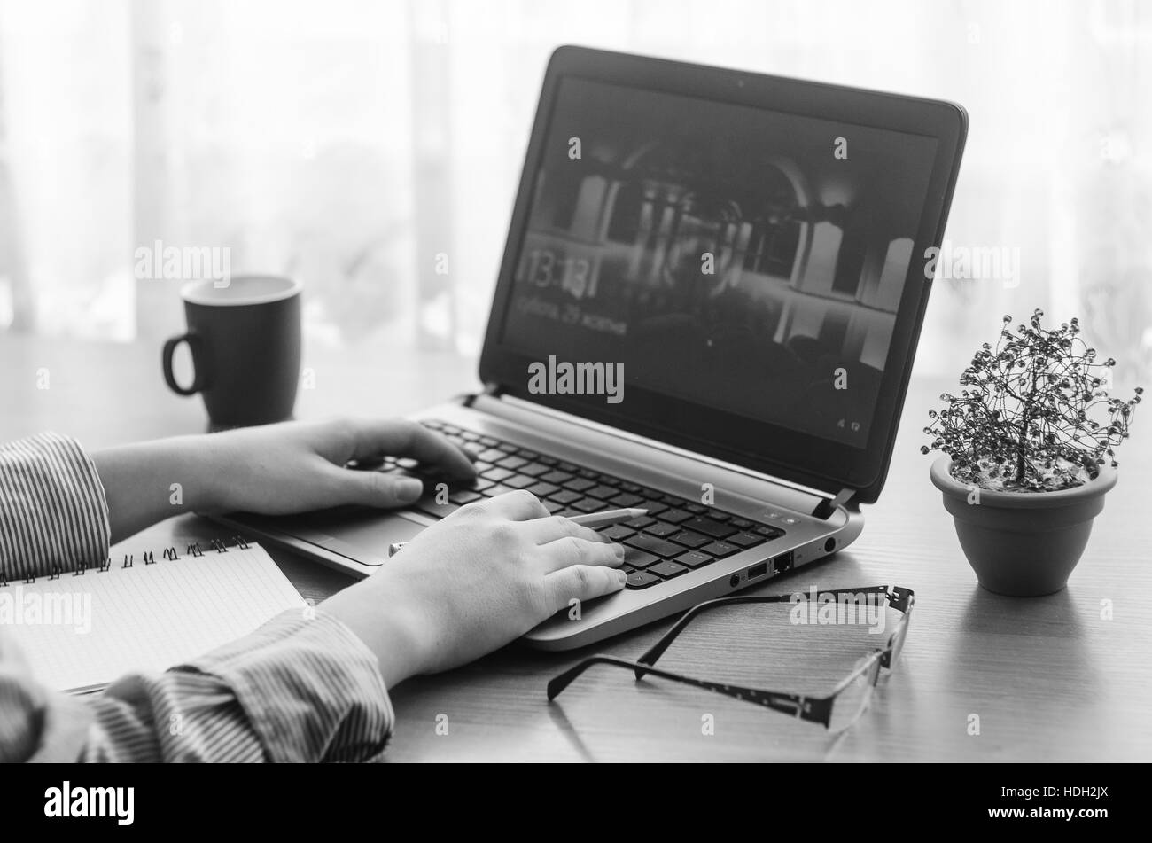 Hands using laptop Black and White Stock Photos & Images - Alamy