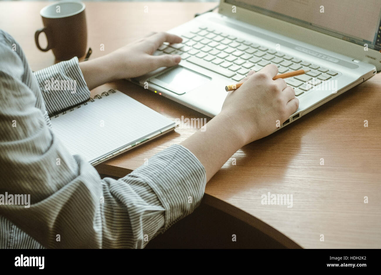 Woman hands typing laptop pen hi-res stock photography and images - Alamy