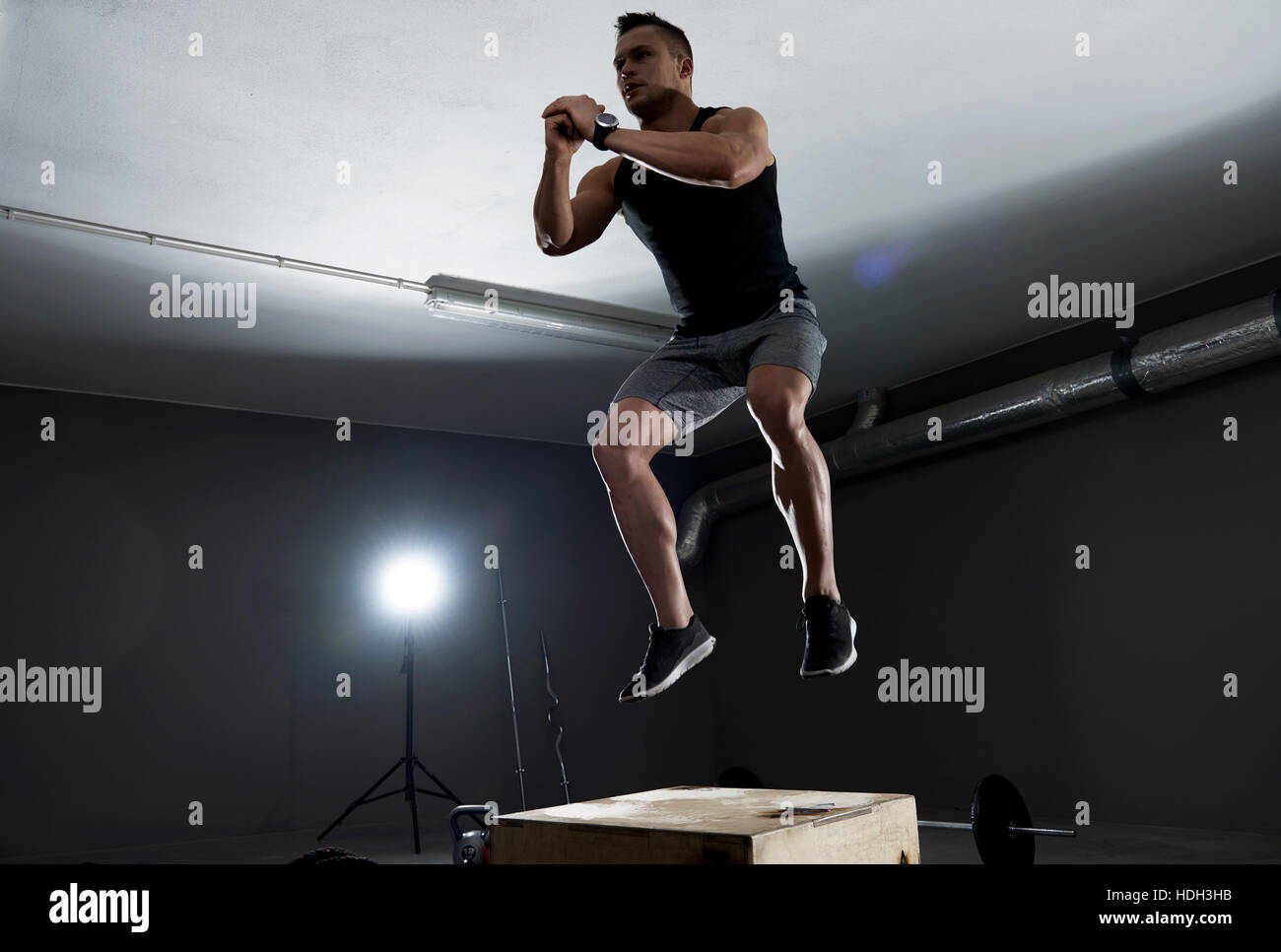 High jump on the wooden box Stock Photo - Alamy