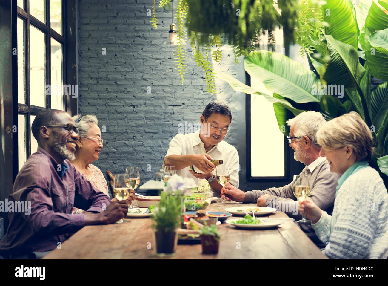 Senior Group Relax Lifestyle Dinning Concept Stock Photo - Alamy
