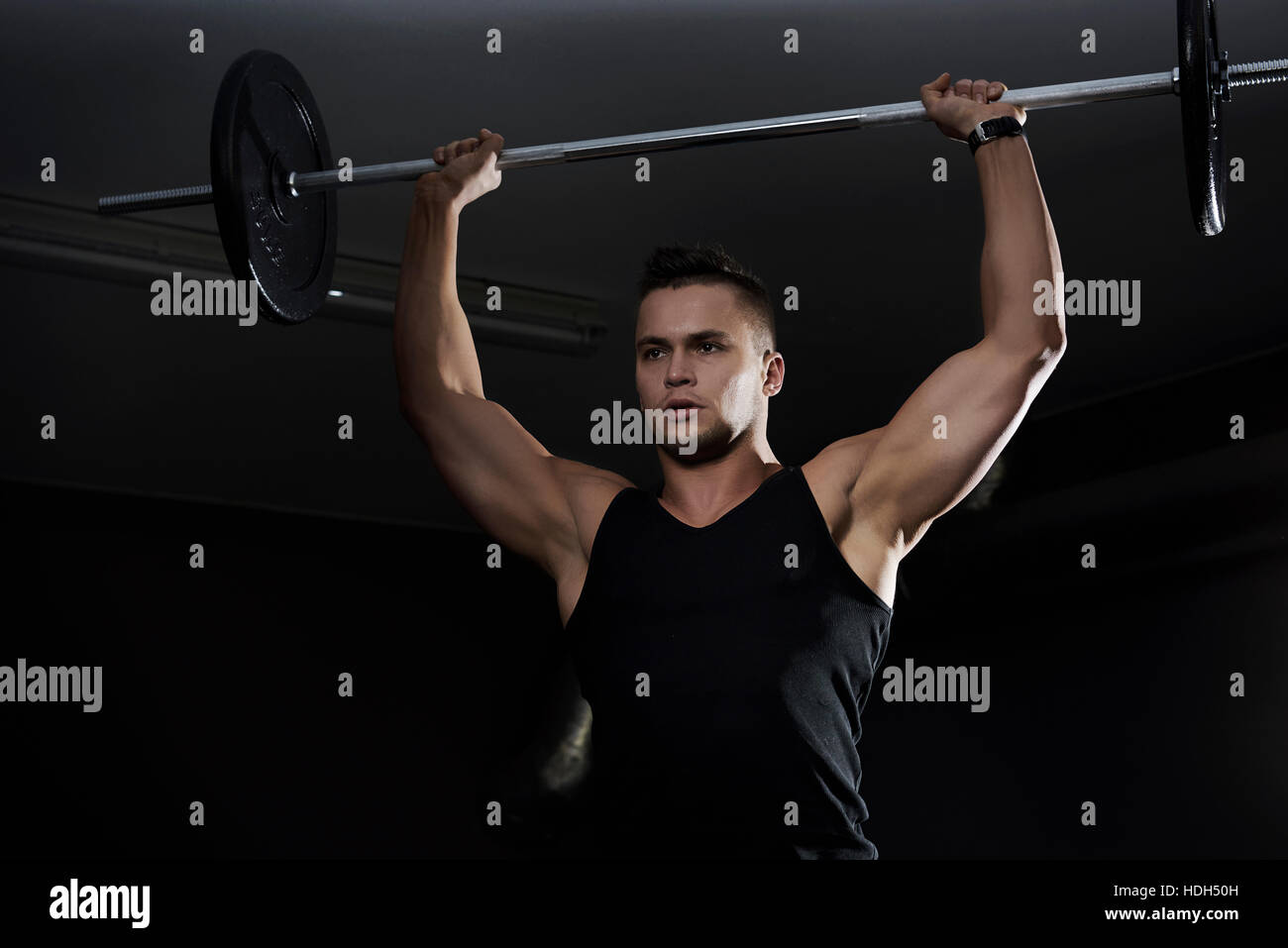 Strong arms to lift such weight Stock Photo - Alamy