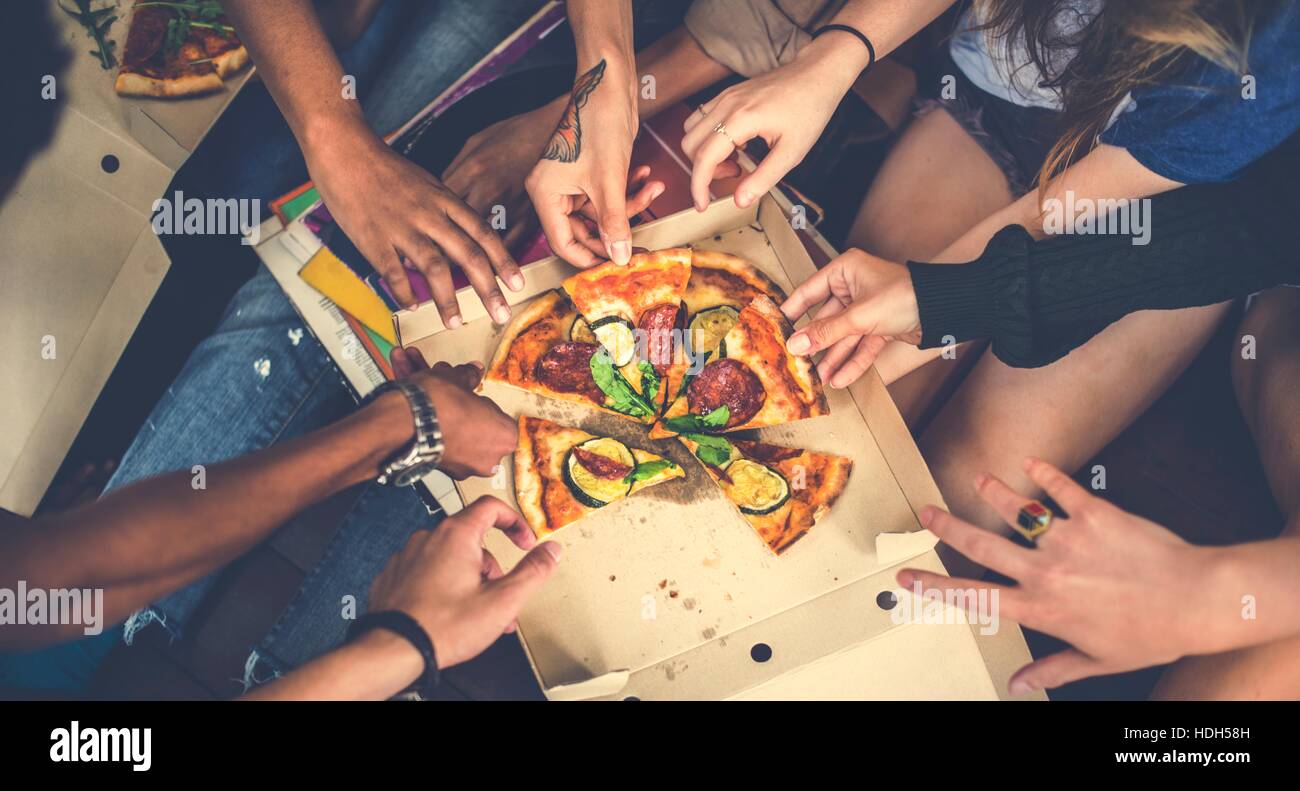 Pizza Sharing Togetherness Friendship Community Concept Stock Photo - Alamy