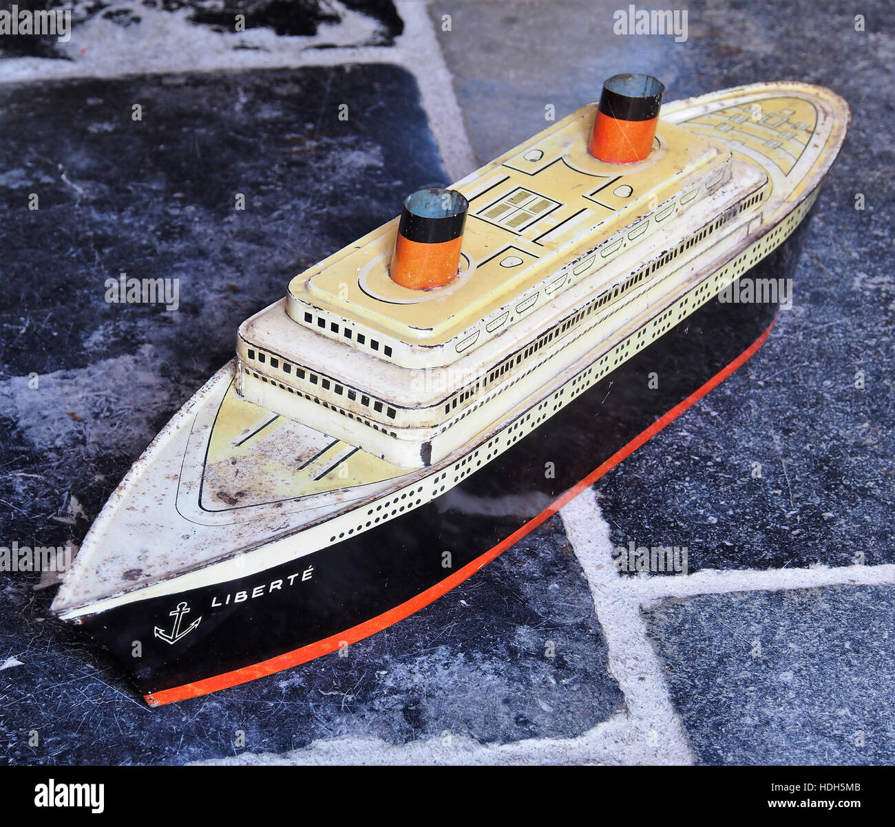 This image showcases the Ship Liberte tin housed in the Museum of ...