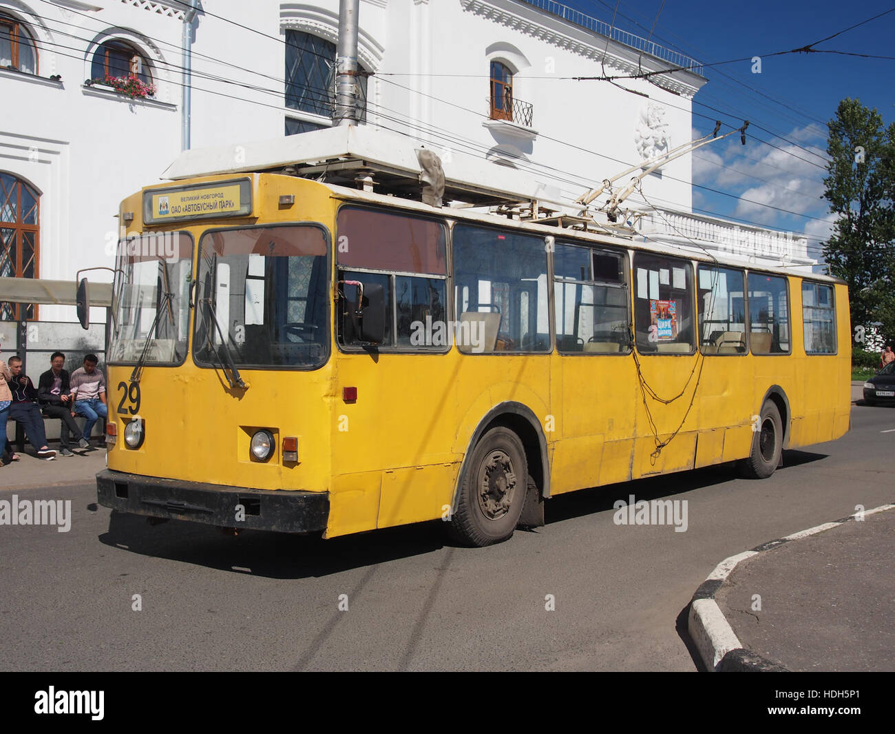 This image features a LiAZ bus stationed in front of the Veliky ...