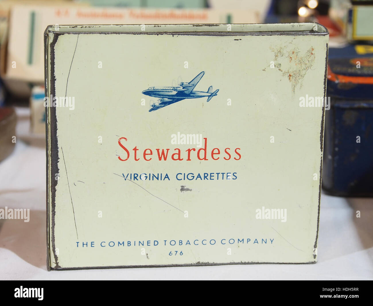 A vintage image of a Stewardess cigarettes tin, featuring a depiction ...