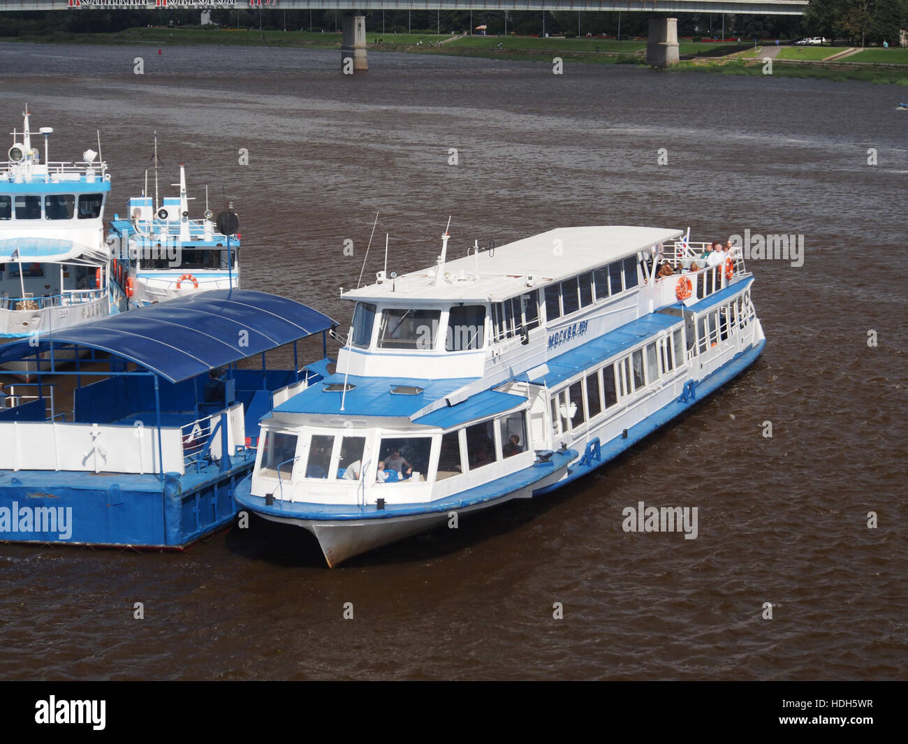 The image, labeled MOCKBA-101, shows a scenic view of the Volkhov River ...