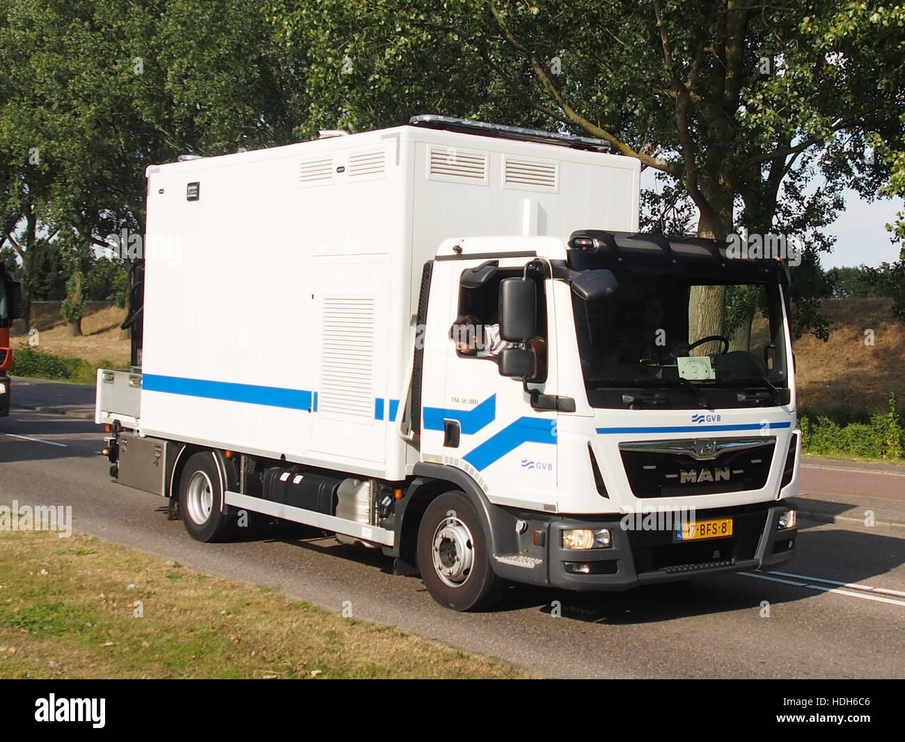 This image shows a fleet of large transport trucks, used for heavy-duty ...