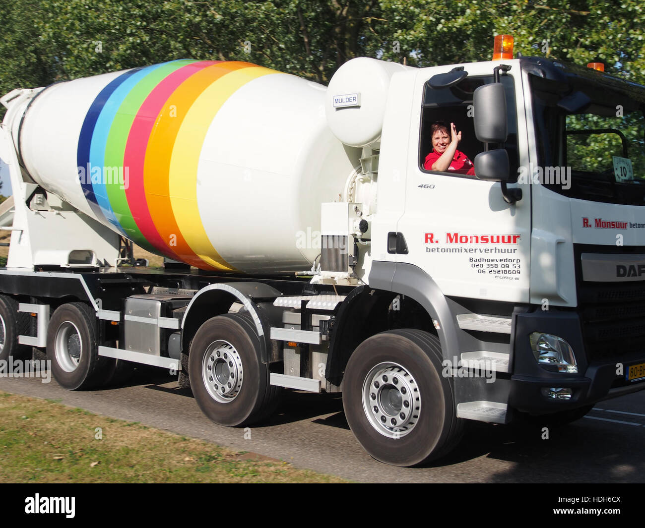 This image captures large transport trucks in motion, showcasing their ...