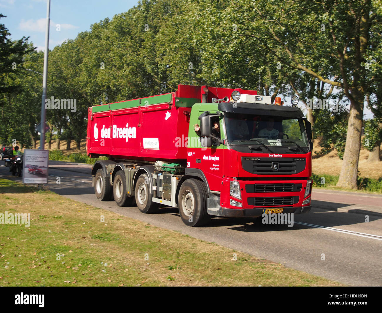 This image features a large transport truck, often used for heavy-duty ...