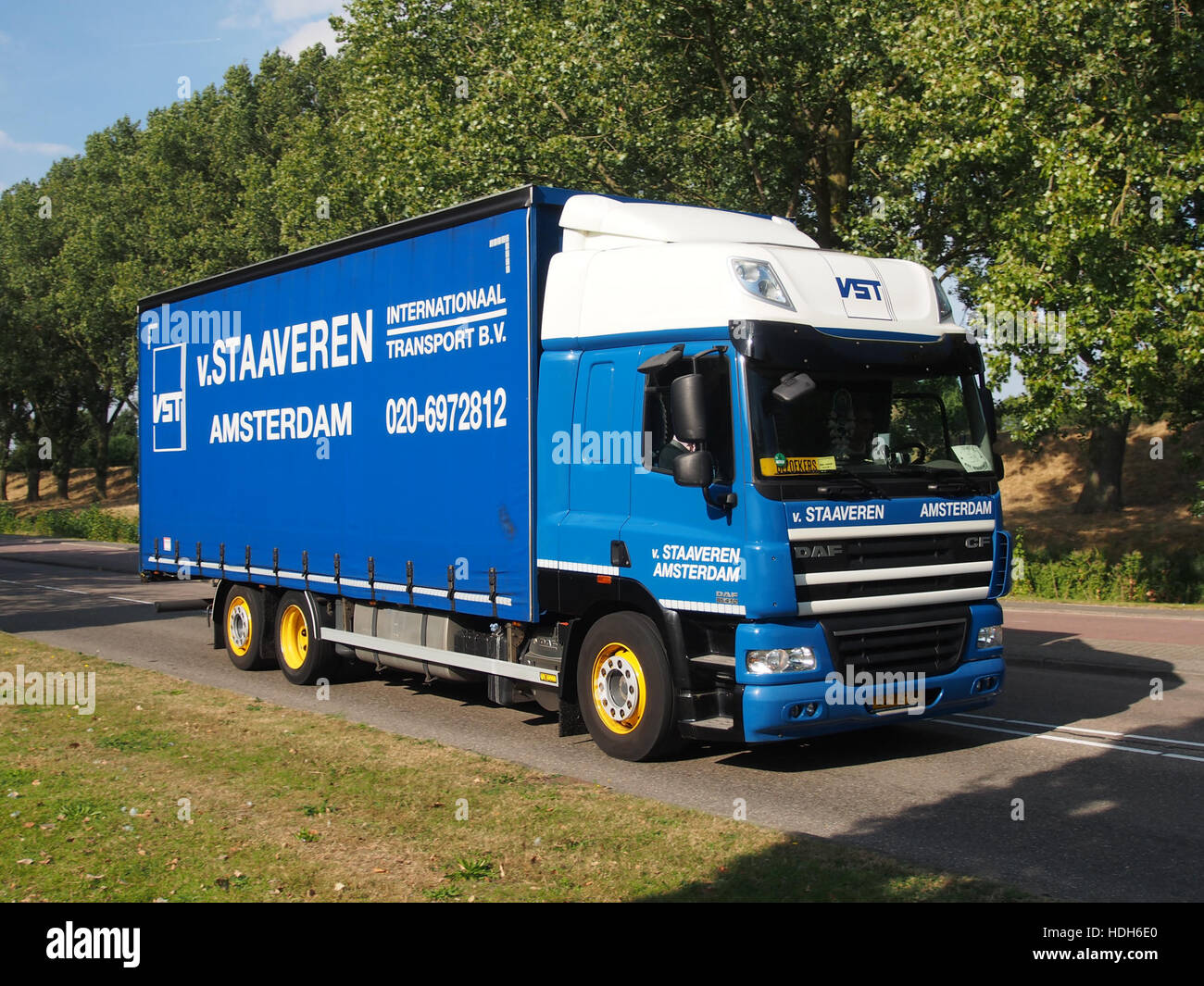 A large truck used for vehicle transport is shown, capable of carrying ...