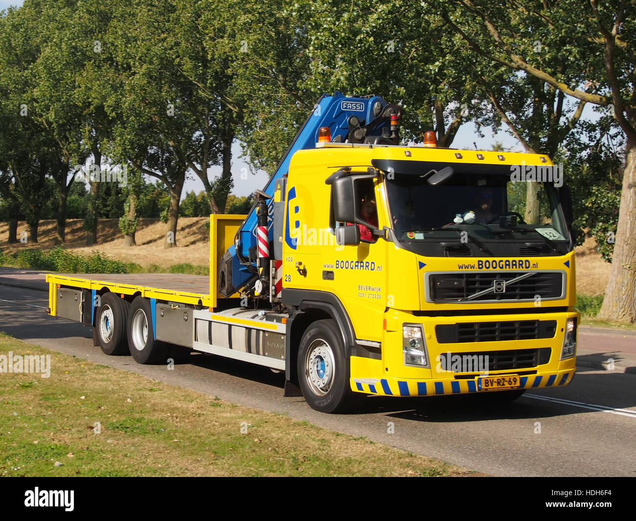 This image showcases a large truck designed for transporting heavy ...