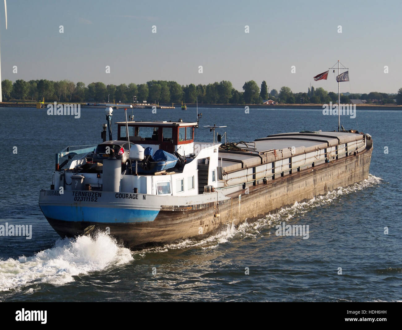 The *Courage*, a ship built in 1962, is depicted passing through the ...
