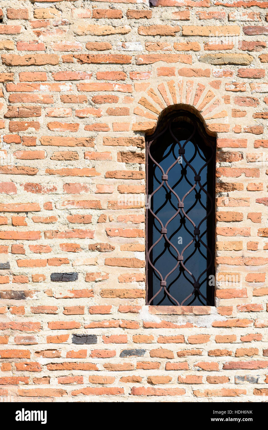 Old Castle Window On Brick Wall Stock Photo - Alamy