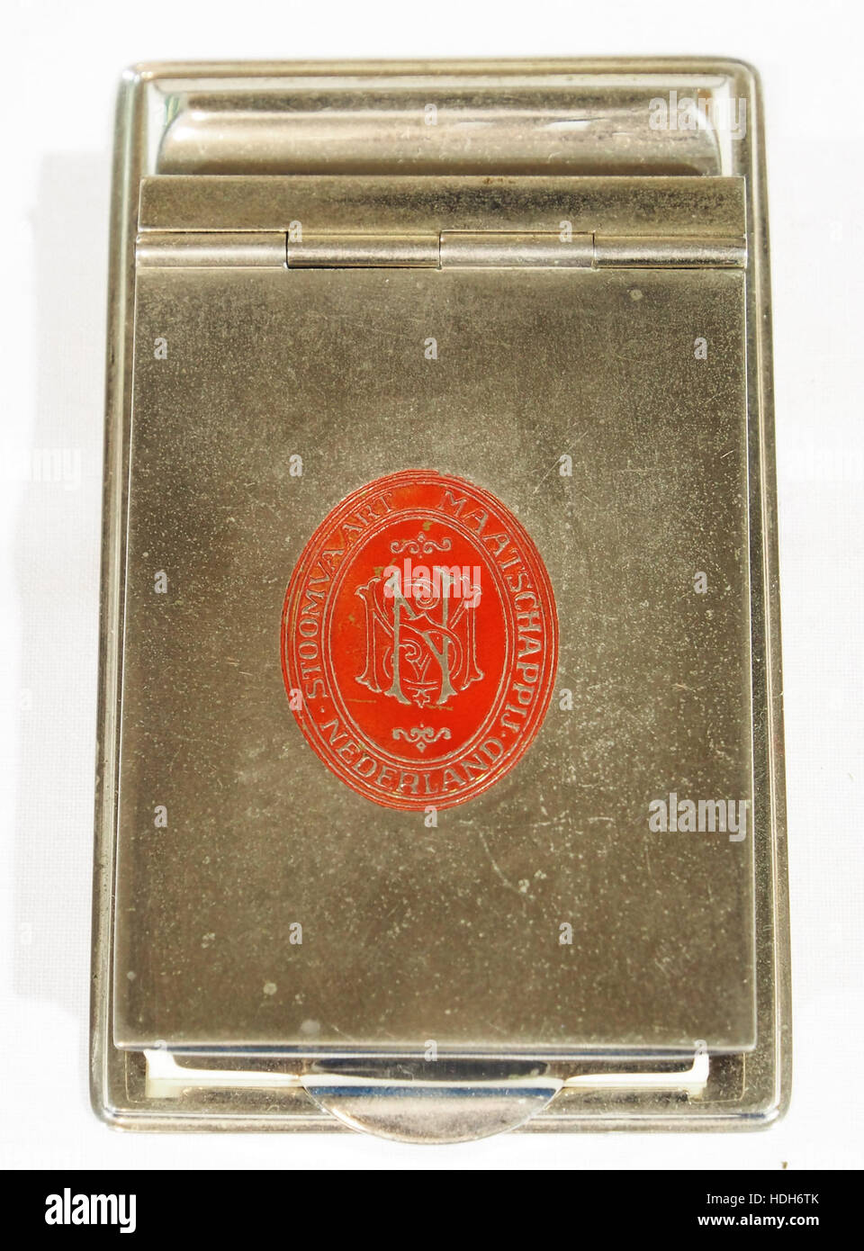 This vintage metal notepad holder was produced by Stoomvaart ...