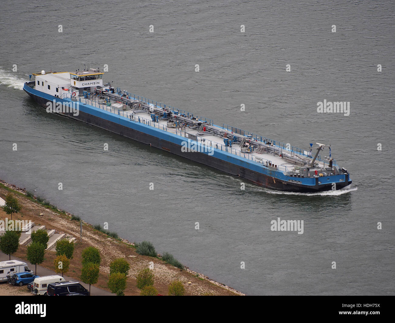 The Chamsin is a modern vessel navigating the Rhine River near Sankt ...