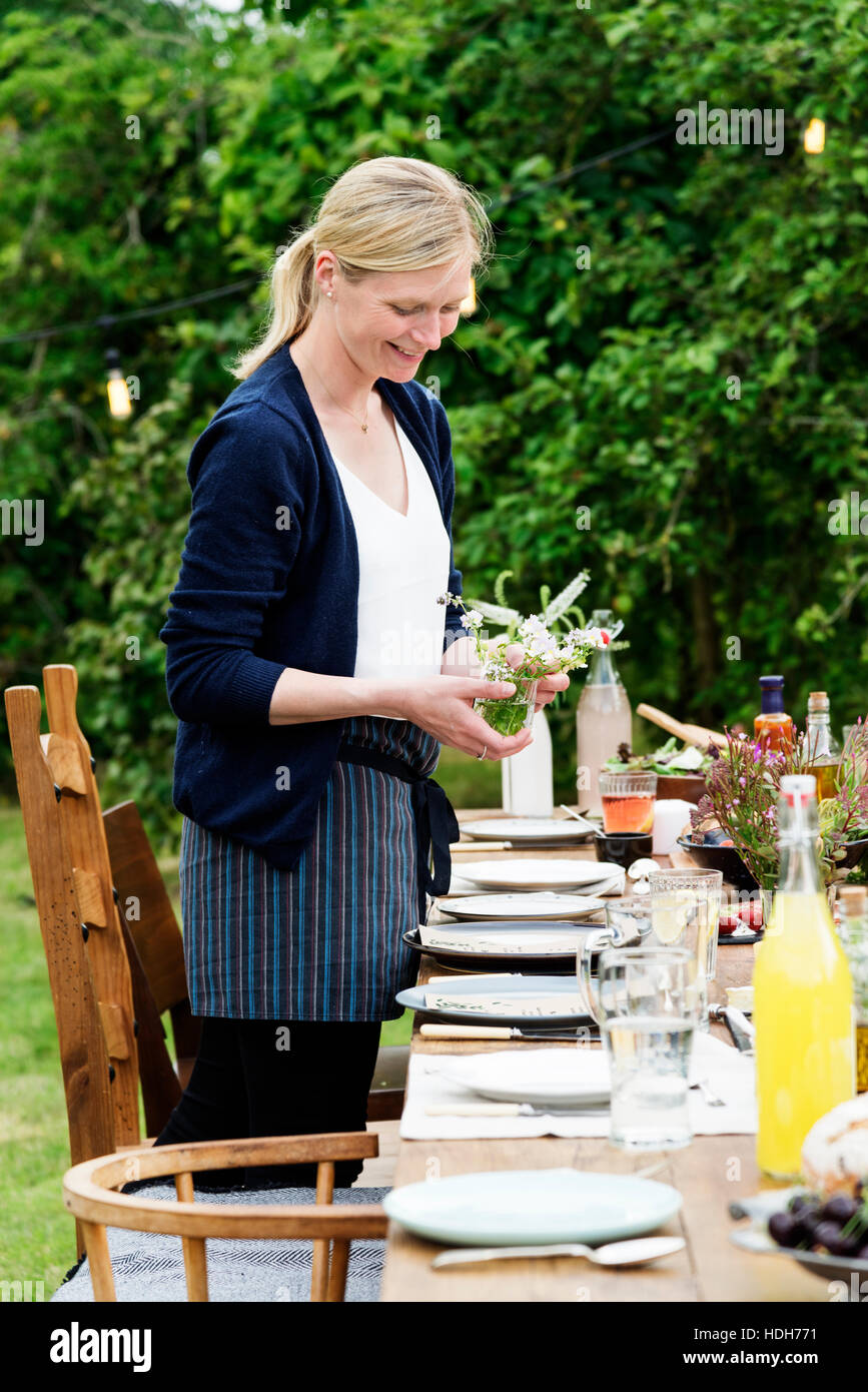 Woman Preparing Table Dinner Concept Stock Photo - Alamy