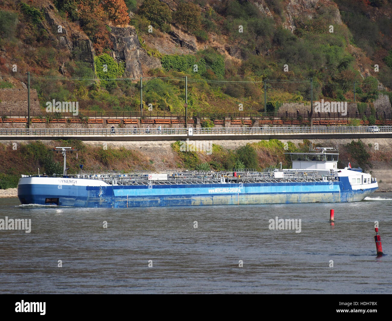 The 'Synergy,' a modern ship built in 2011, navigates the Rhine River ...