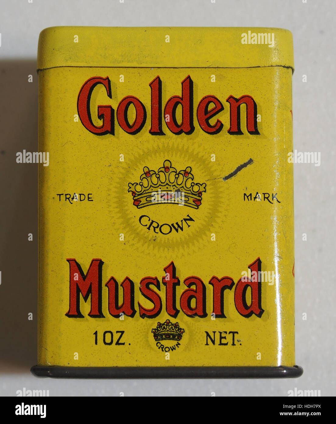 This vintage 'Golden Mustard' tin, often used for storing biscuits or ...
