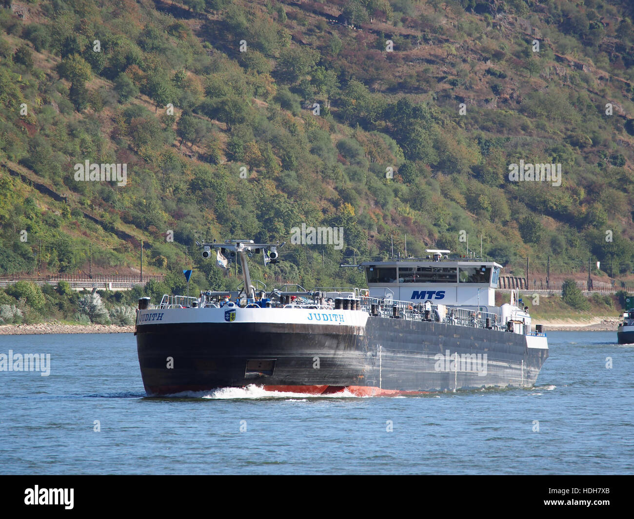 This image captures the Judith, a modern ship sailing on the Rhine ...