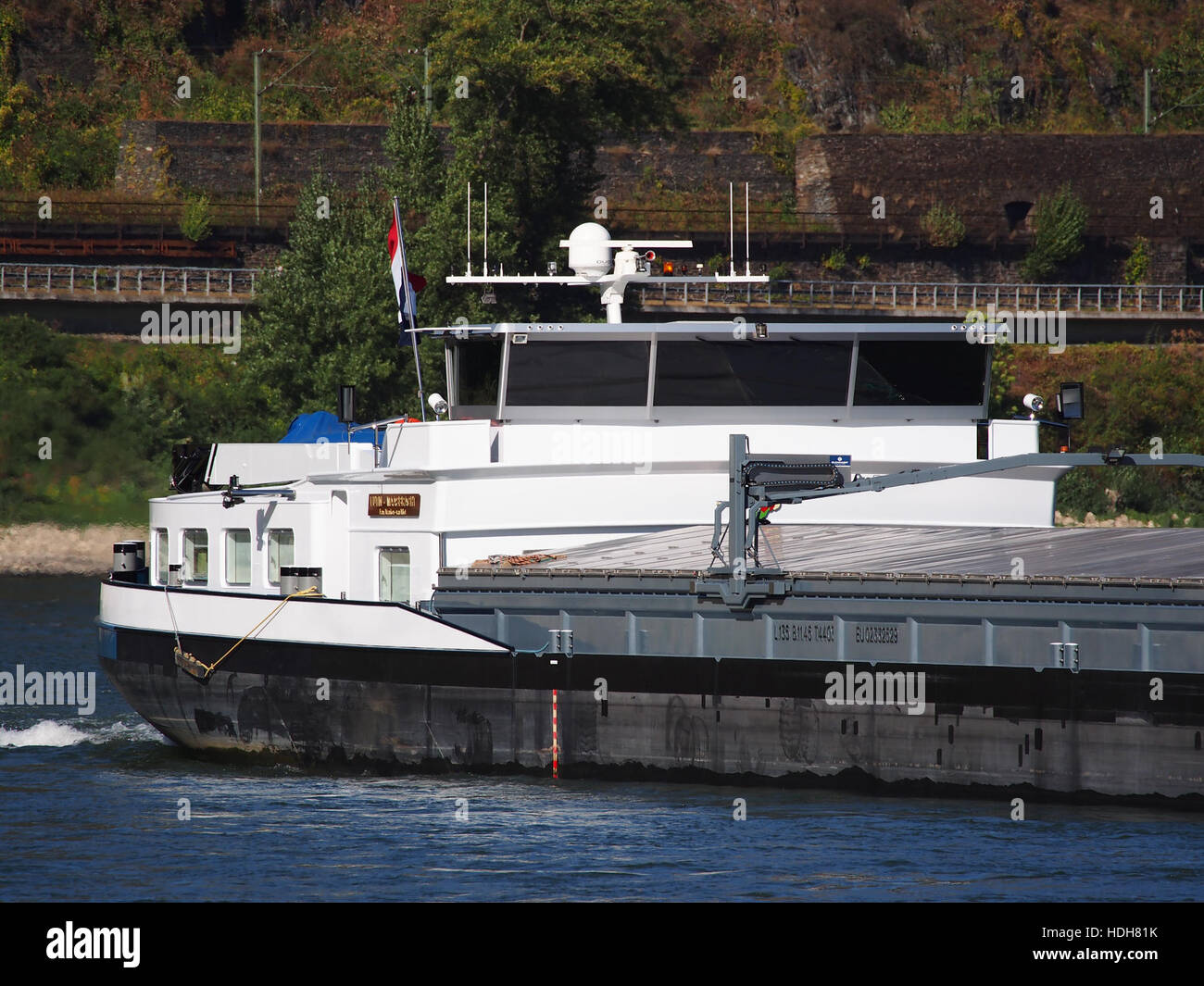 The vessel Lutin, identified by ENI 02332529, is shown navigating the Rhine River at Oberwesel ...