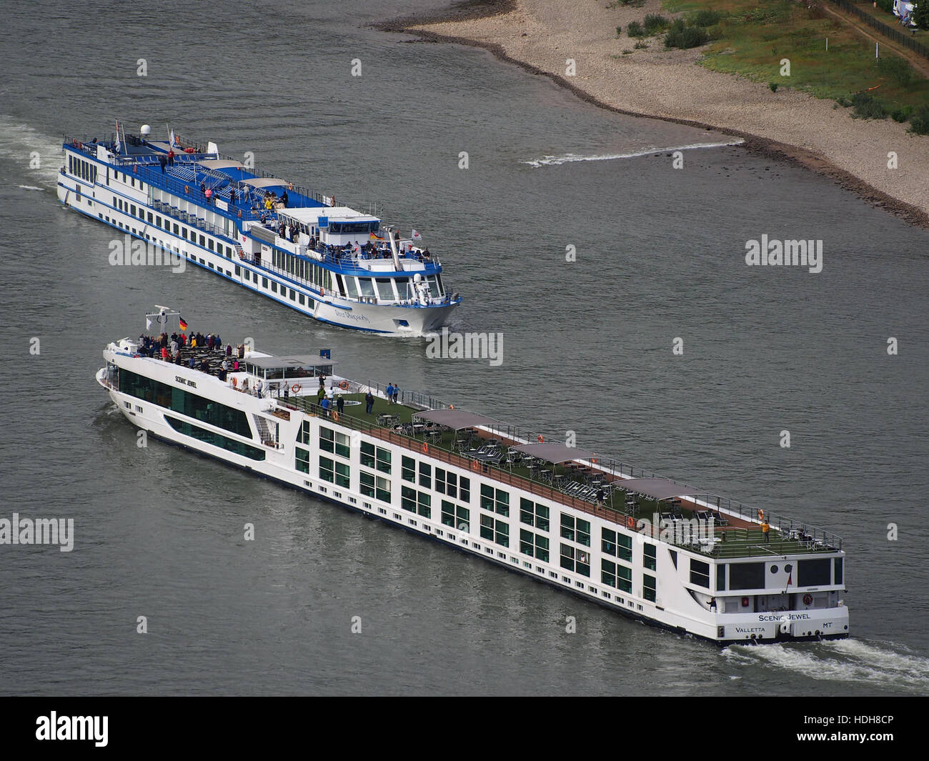 The ships 'River Rhapsody' and 'Scenic Jewel' are shown on the Rhine ...