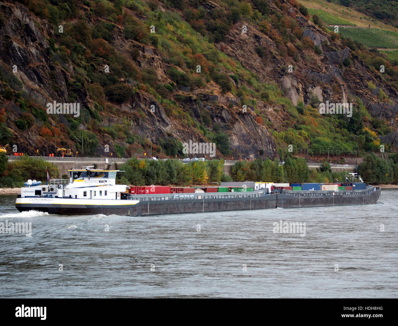 A photograph of the Contargo I and Contargo X barges on the Rhine River ...