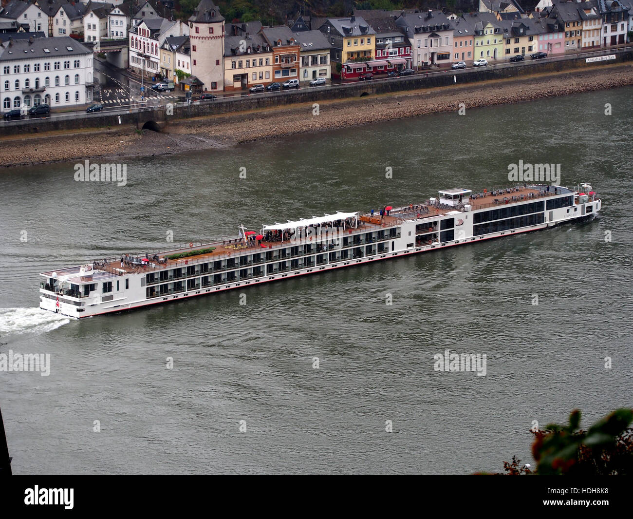 This image shows the Viking Vili, a river cruise ship, passing through ...