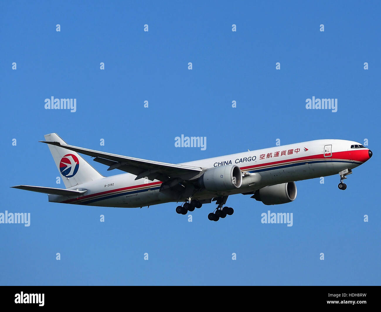 This image depicts an aeroplane soaring high above the earth, capturing ...