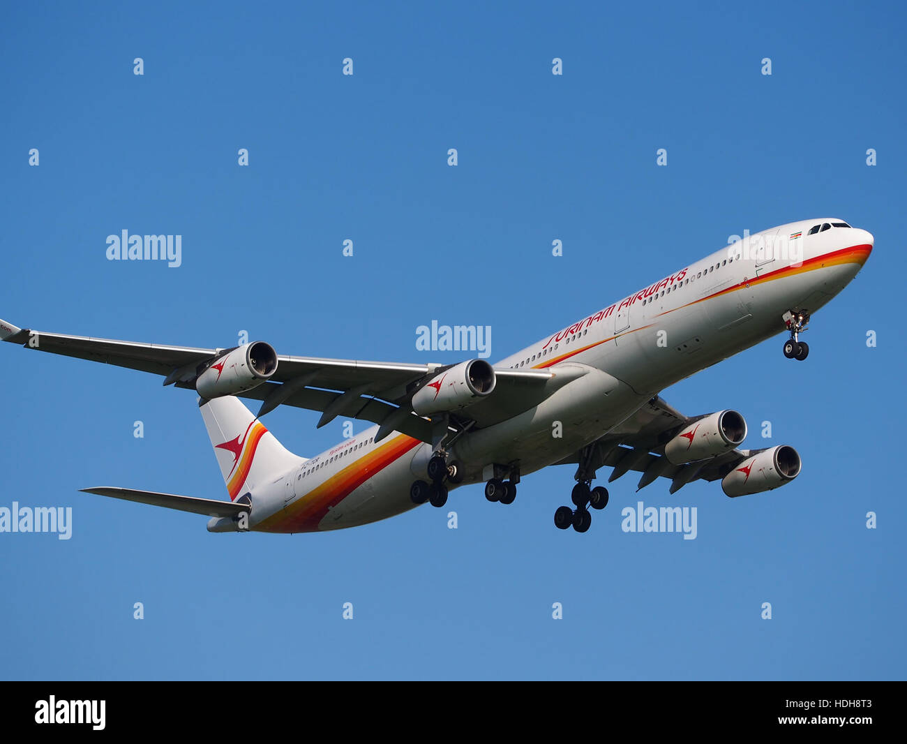 A depiction of an aircraft flying through the sky with wings extended ...