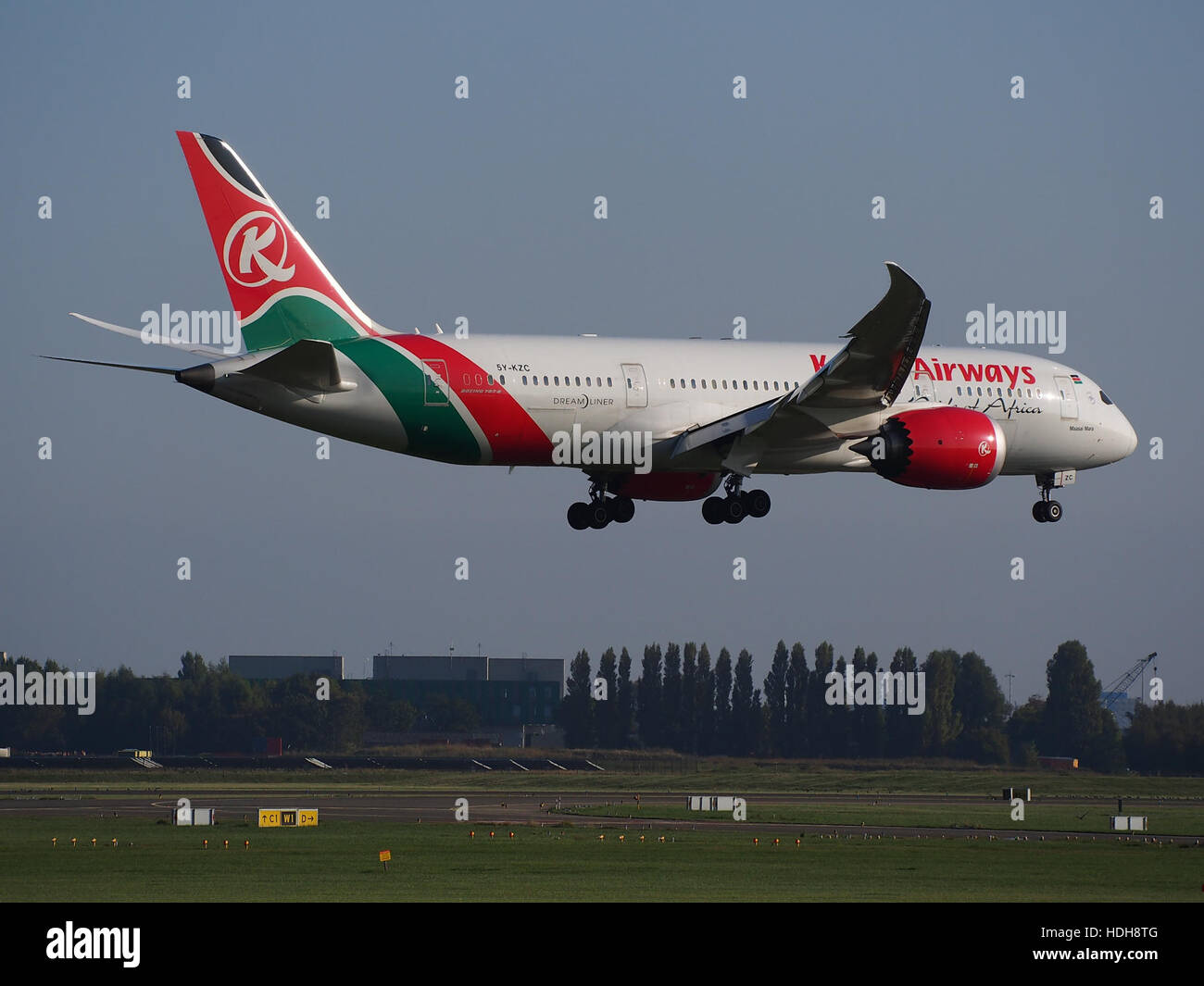 This image captures an aeroplane in flight, soaring through the sky ...