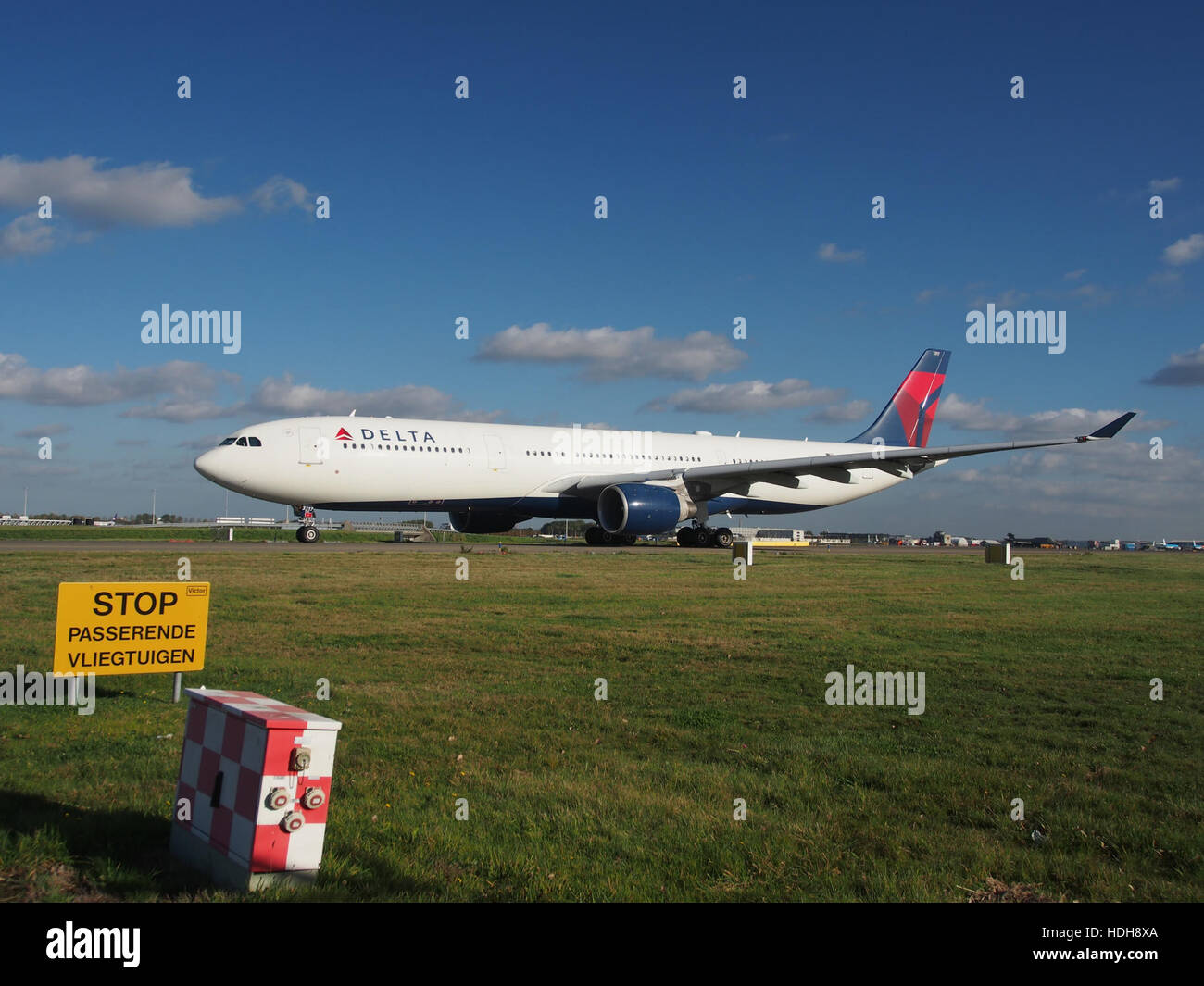 The aircraft N817NW taxis at Schiphol Airport preparing for takeoff ...