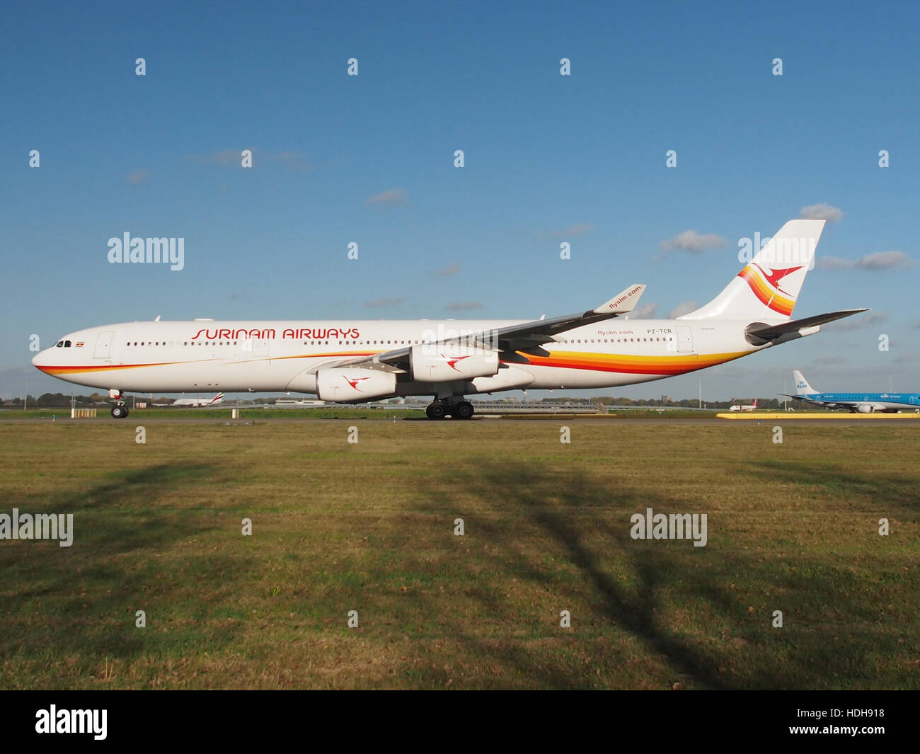 This image shows the aircraft PZ-TCR taxiing on the tarmac at Schiphol ...